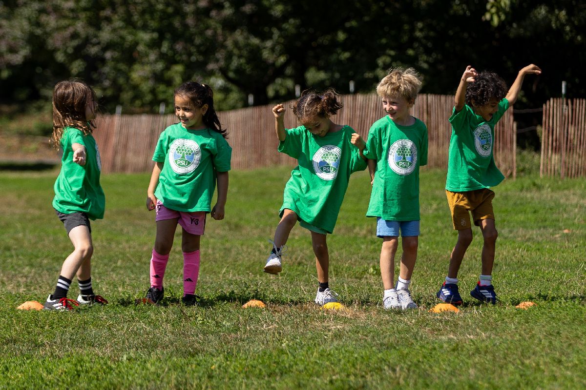 kids happy and excited in soccer class